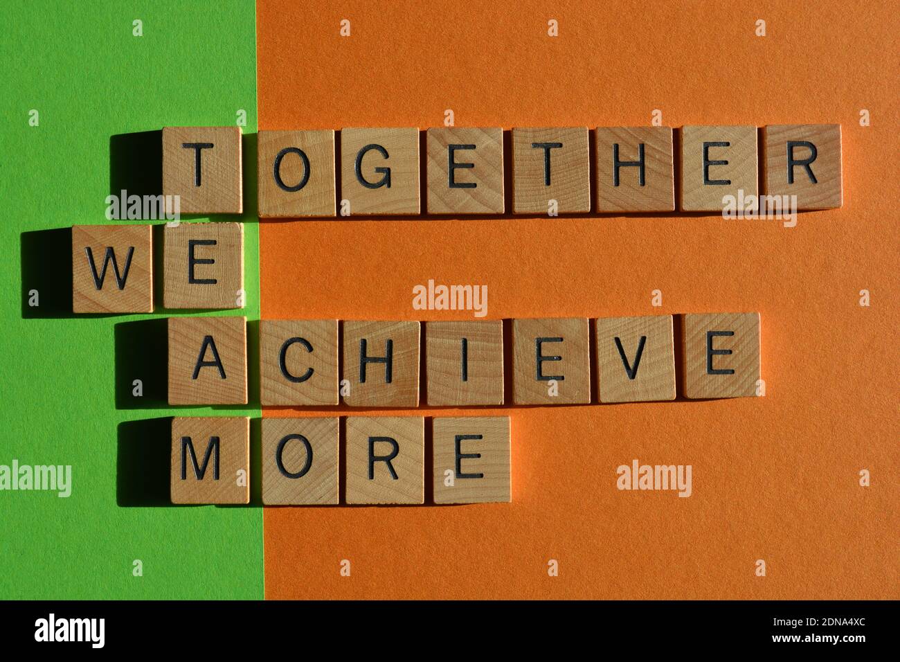 Team, Together We Achieve More, words in wooden alphabet letters ...
