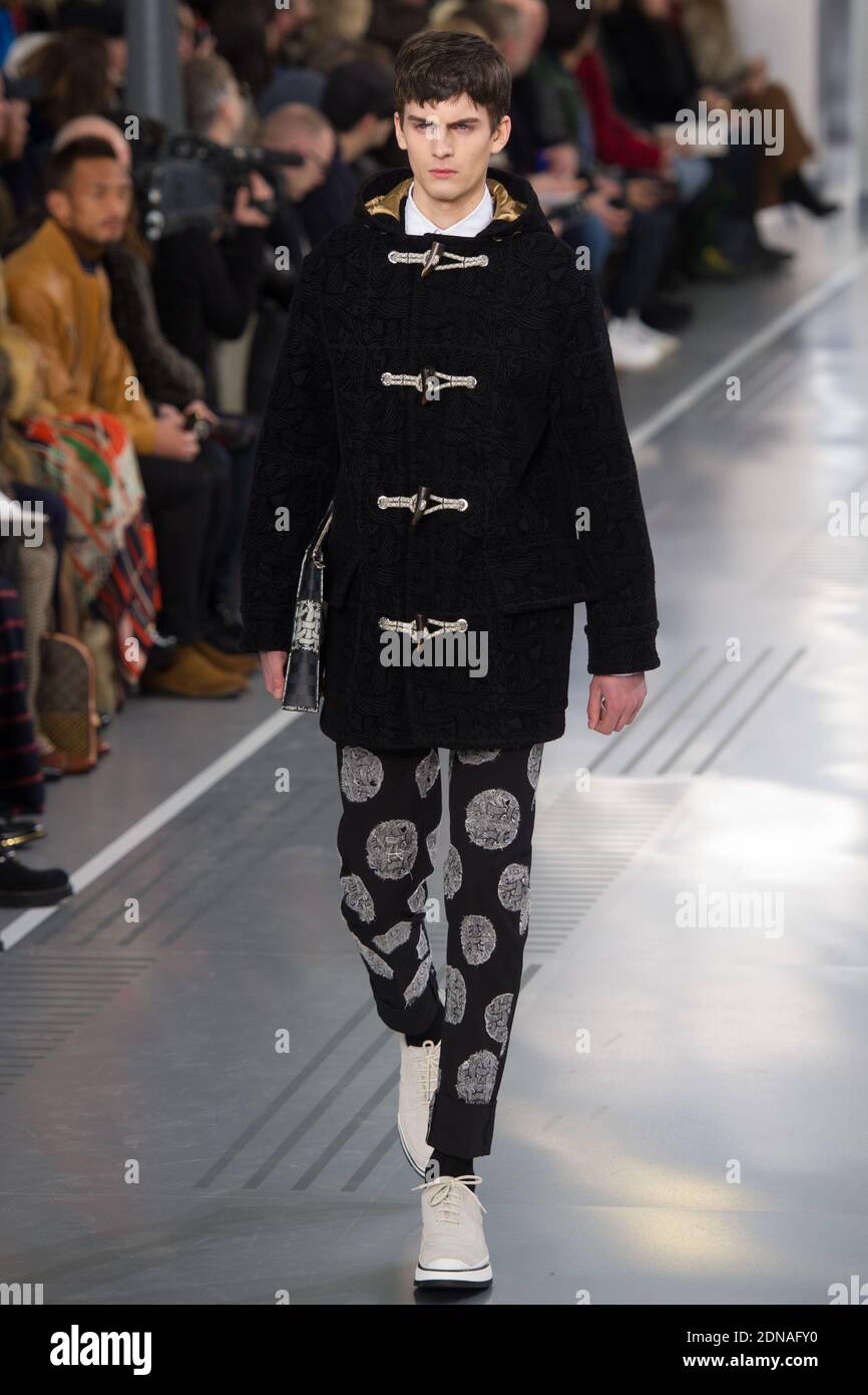 A model displays a creation by designer Kim Jones for Louis Vuitton ...