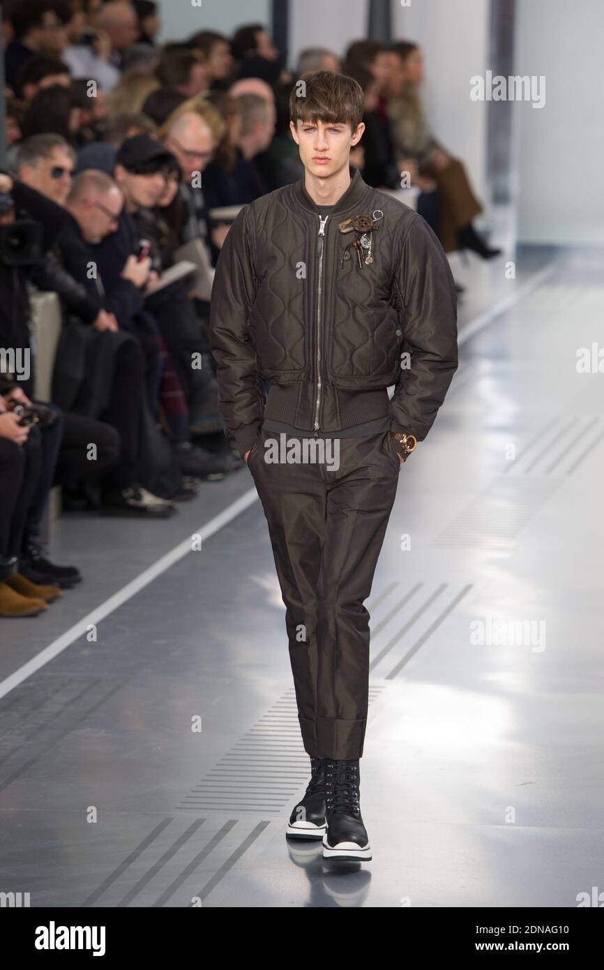 A model displays a creation by designer Kim Jones for Louis Vuitton ...