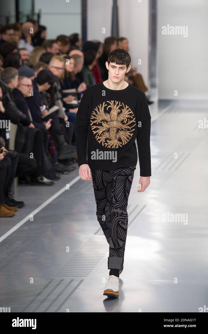 A model displays a creation by designer Kim Jones for Louis Vuitton ...