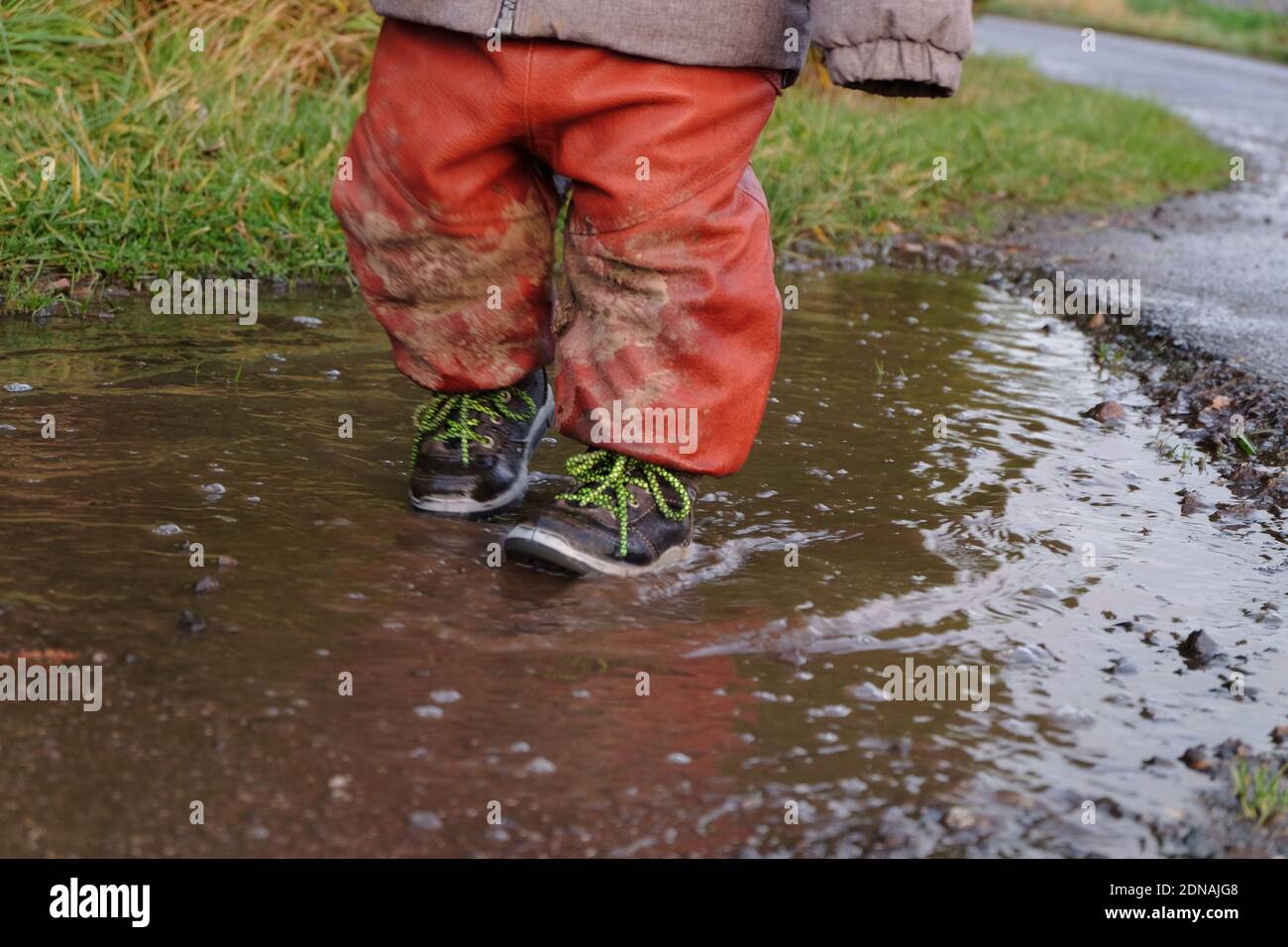 Baby shoe in mud hi-res stock photography and images - Alamy