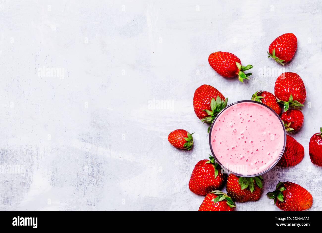 Strawberry milkshake with berries, food background, top view Stock ...