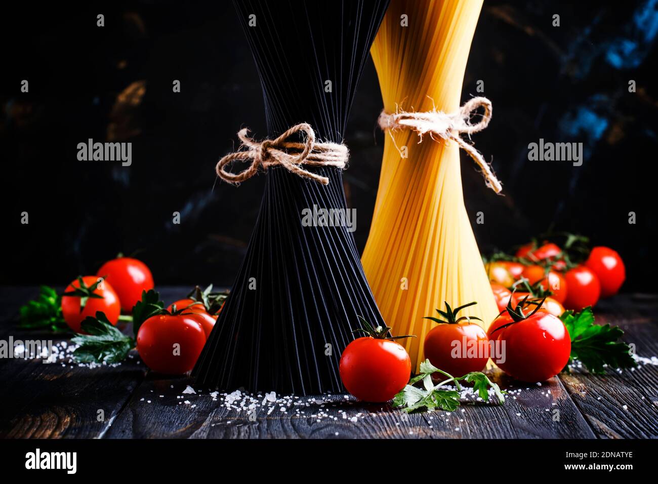 Spaghetti and tomatoes, still life in low key, selective focus Stock ...