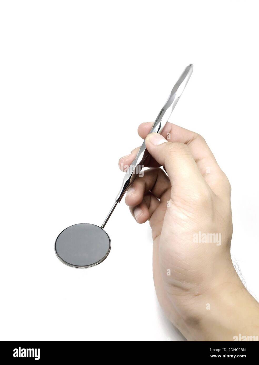 Close-up Of Human Hand Holding Angled Mirror Against White Background ...