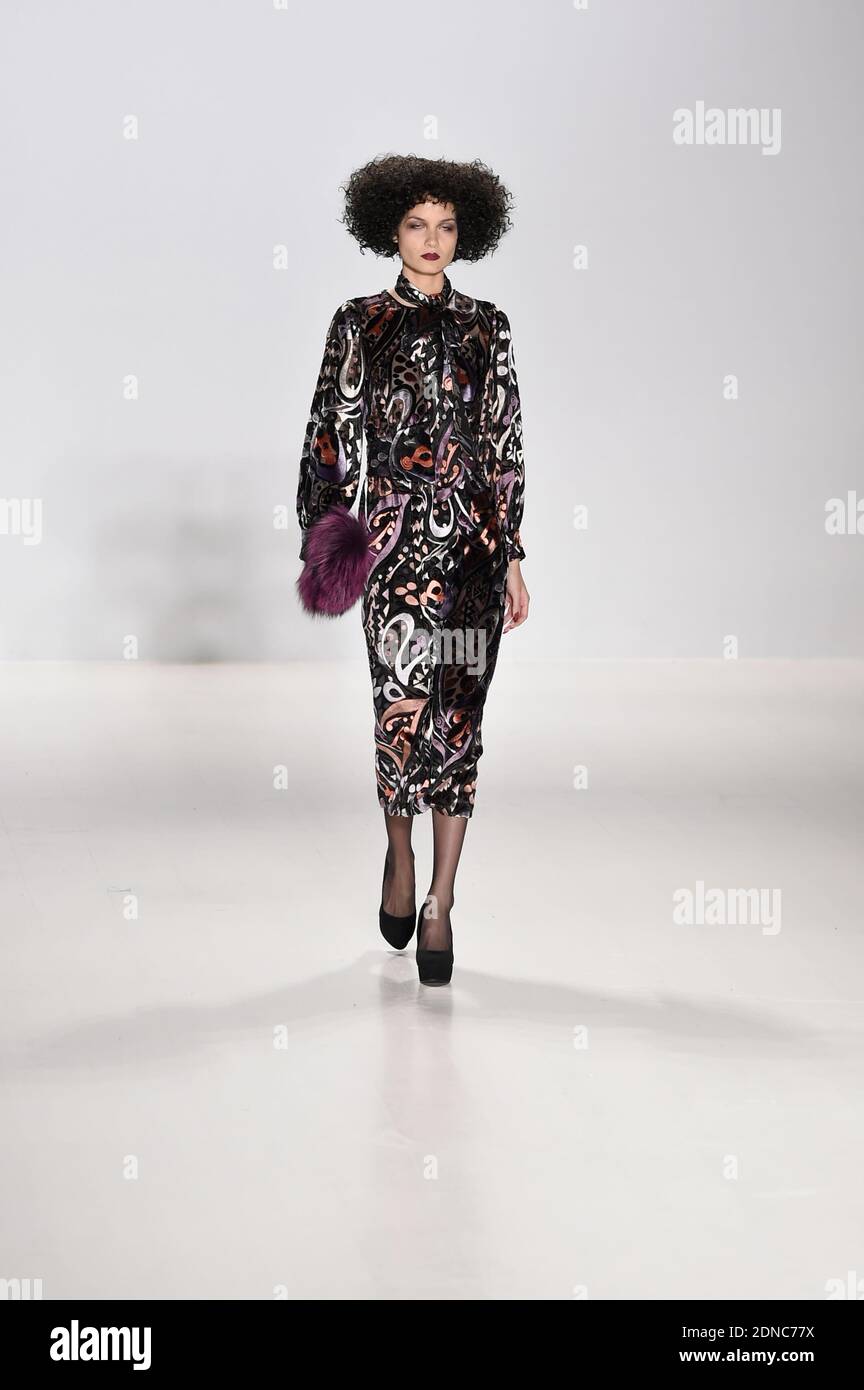 A model walks the runway at the Georgine fashion show during Mercedes ...