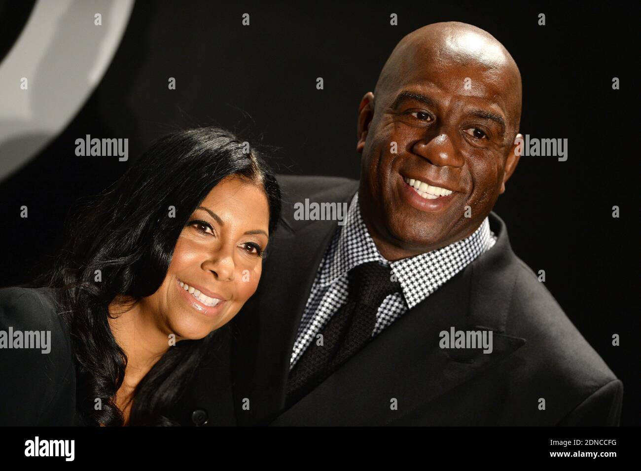 Earlitha 'Cookie' Kelly and Earvin 'Magic' Johnson arrive at the Tom ...