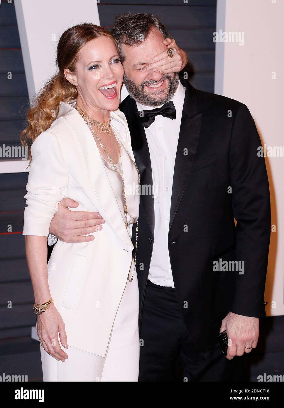 Leslie Mann and Judd Apatow attend the 2015 Vanity Fair Oscar Party ...