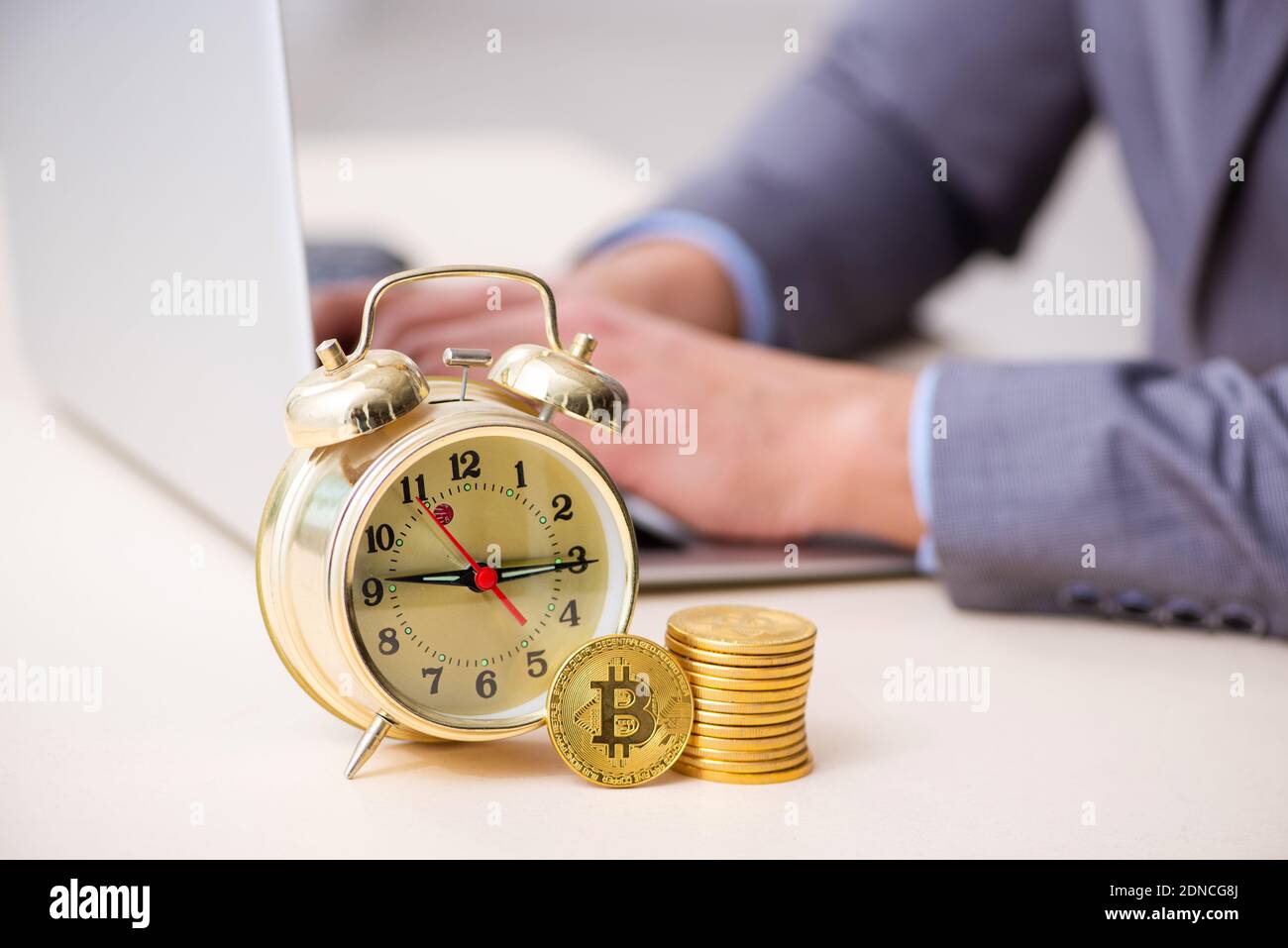 Man earning money via Internet in time management concept Stock Photo ...
