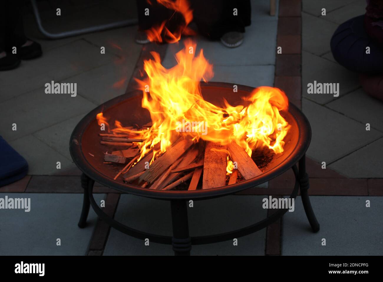 Feet to the fire hi-res stock photography and images - Alamy