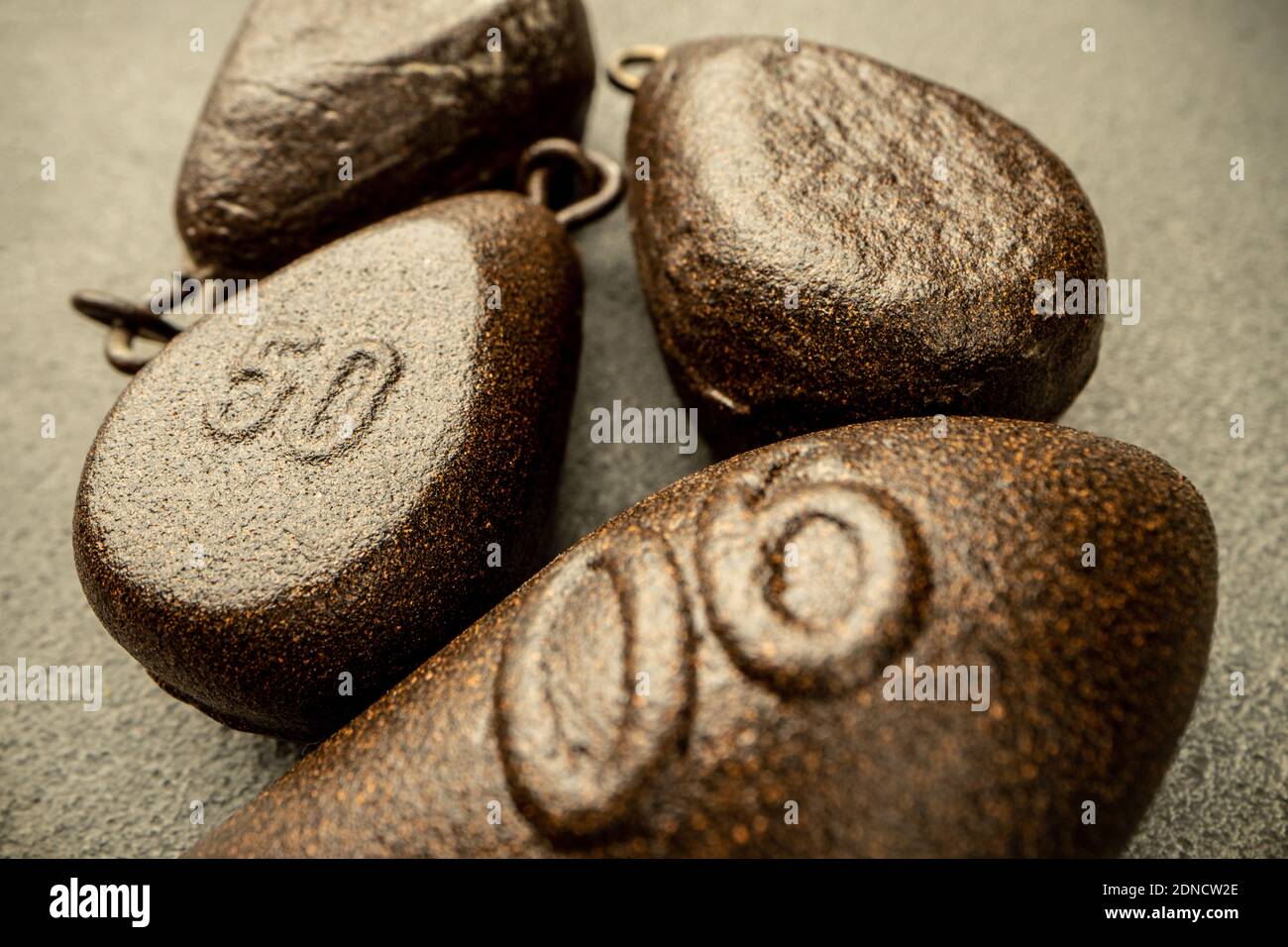 Lead weight for fishing close up photo Stock Photo - Alamy