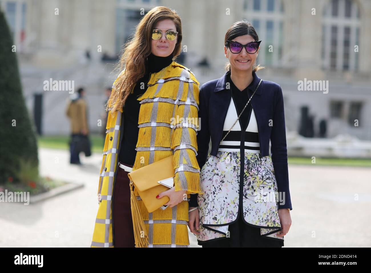 street style, sisters Sara and Giovanna Battaglia arriving at Moncler ...