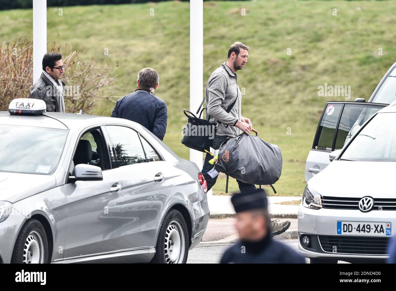French Olympic champion swimmer Alain Bernard enters a taxi outside the ...