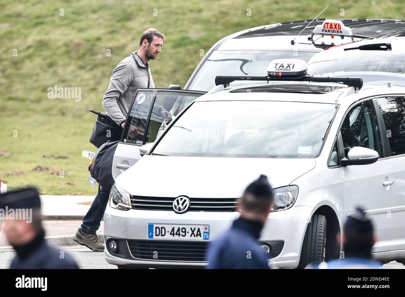 French Olympic champion swimmer Alain Bernard enters a taxi outside the ...