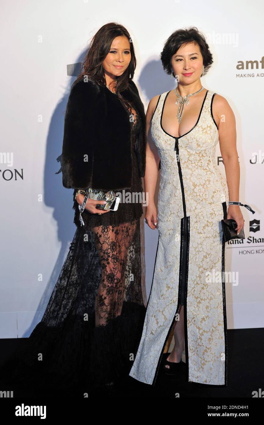 Pansy Ho (right) and a friend arrive on the red carpet during the 2015 ...