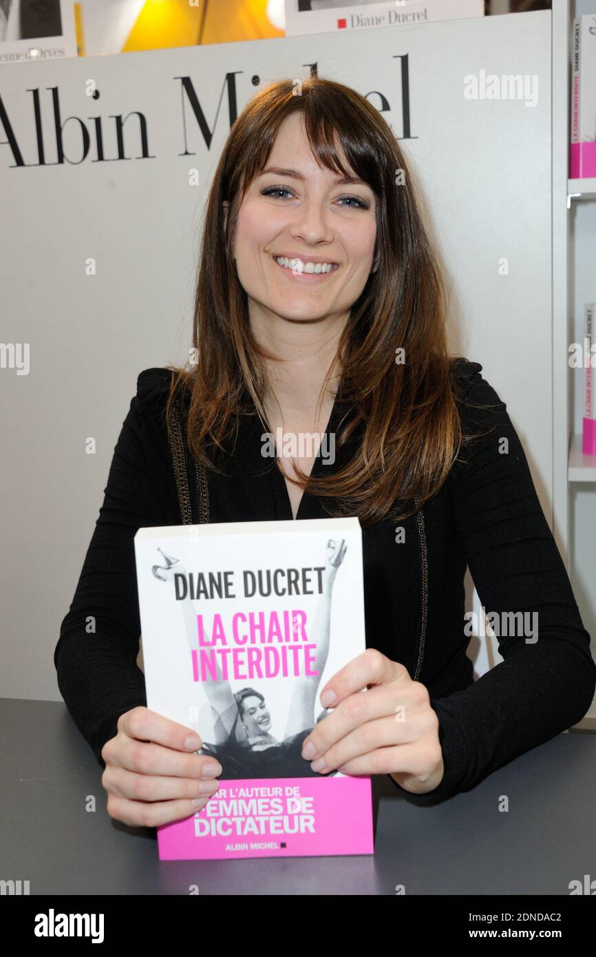 Diane Ducret signs copies of her book during the 35th Salon du Livre de ...