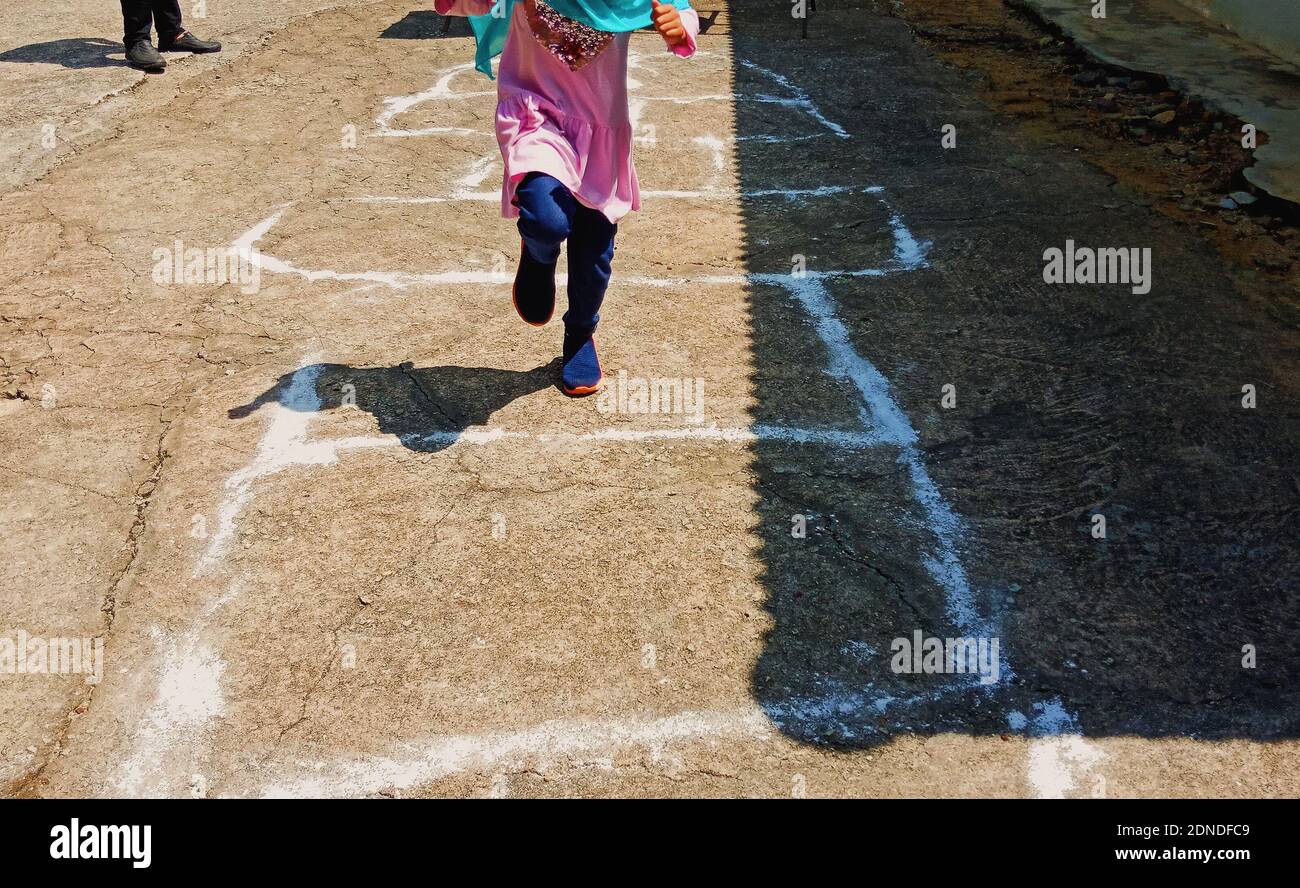 Girls Hopscotch High Resolution Stock Photography and Images - Alamy