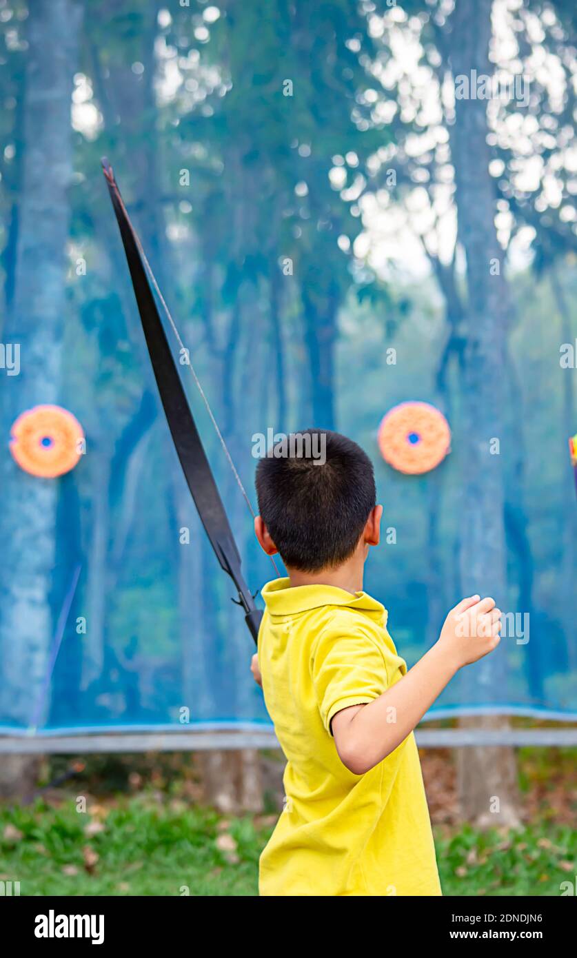 Boy practicing archery hi-res stock photography and images - Alamy