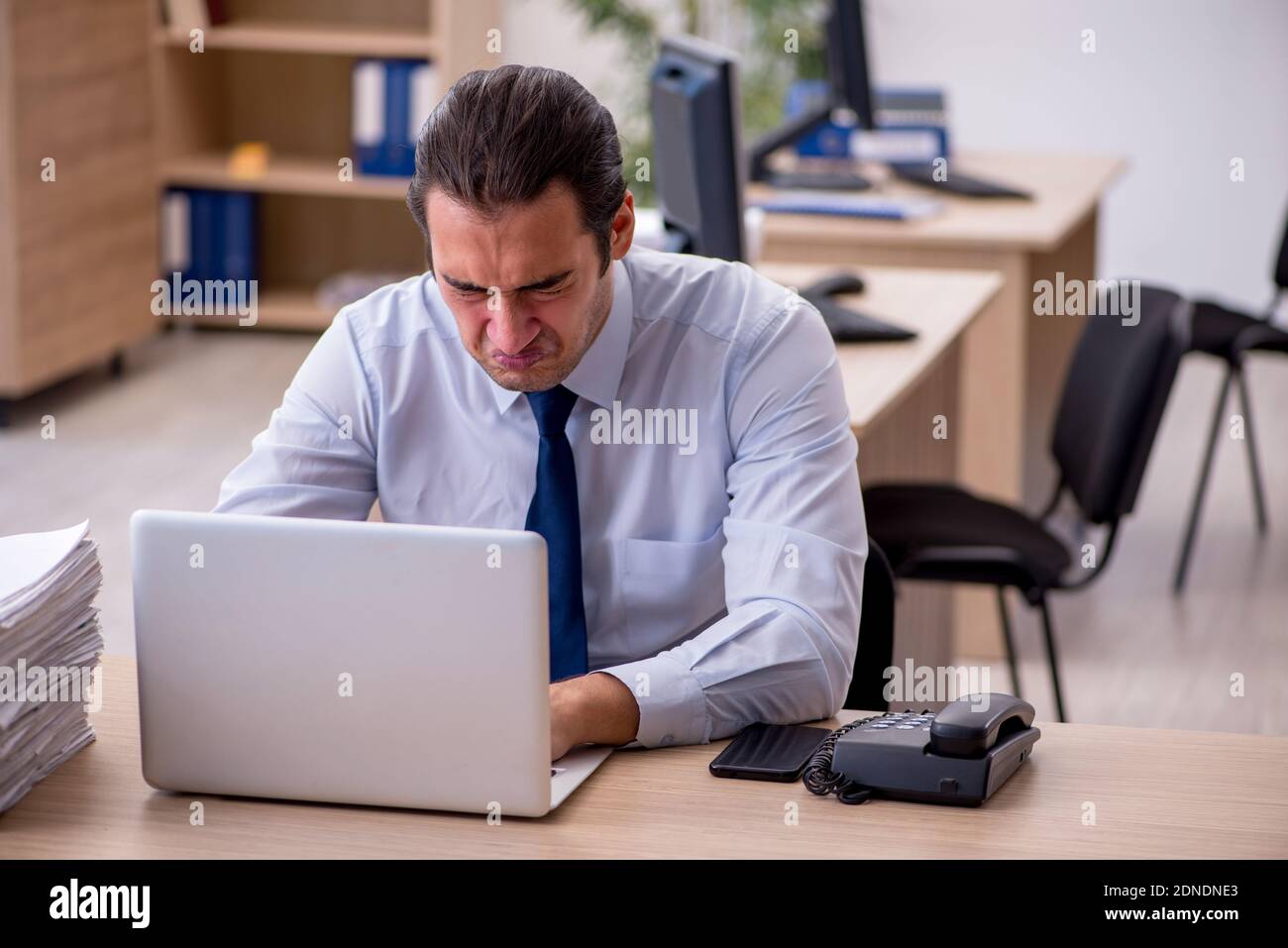 Young man crying sitting computer hi-res stock photography and images ...