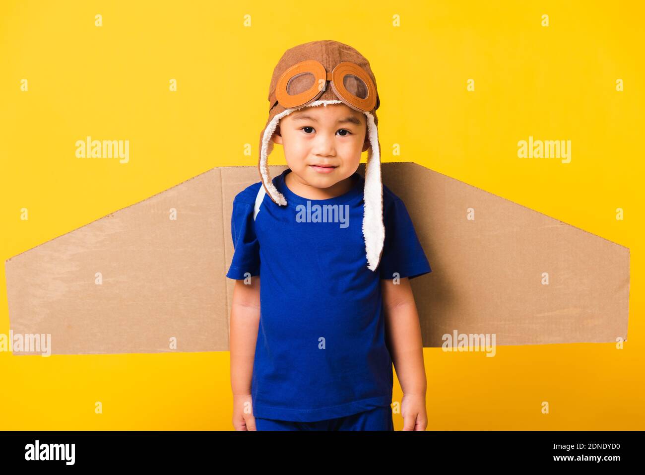 Happy Asian handsome funny child or kid little boy smile wear pilot hat ...