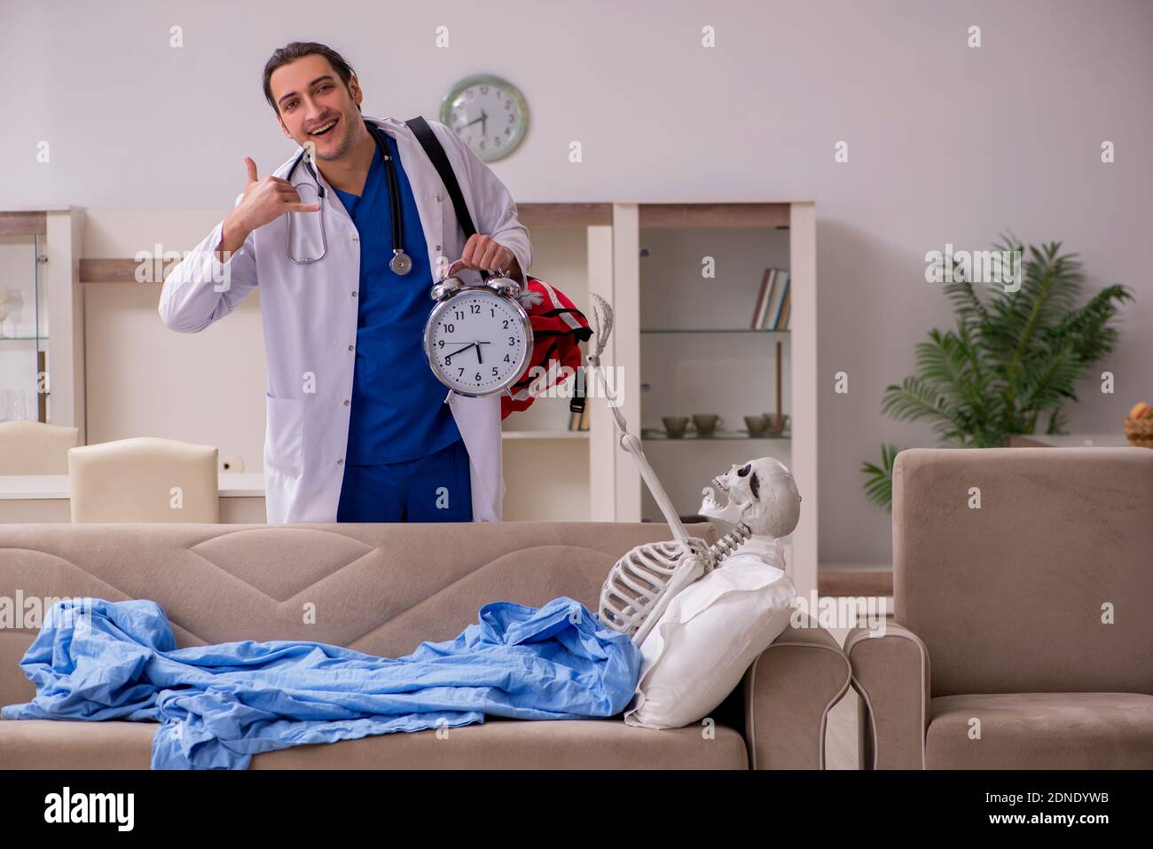 Male paramedic visiting skeleton patient Stock Photo - Alamy