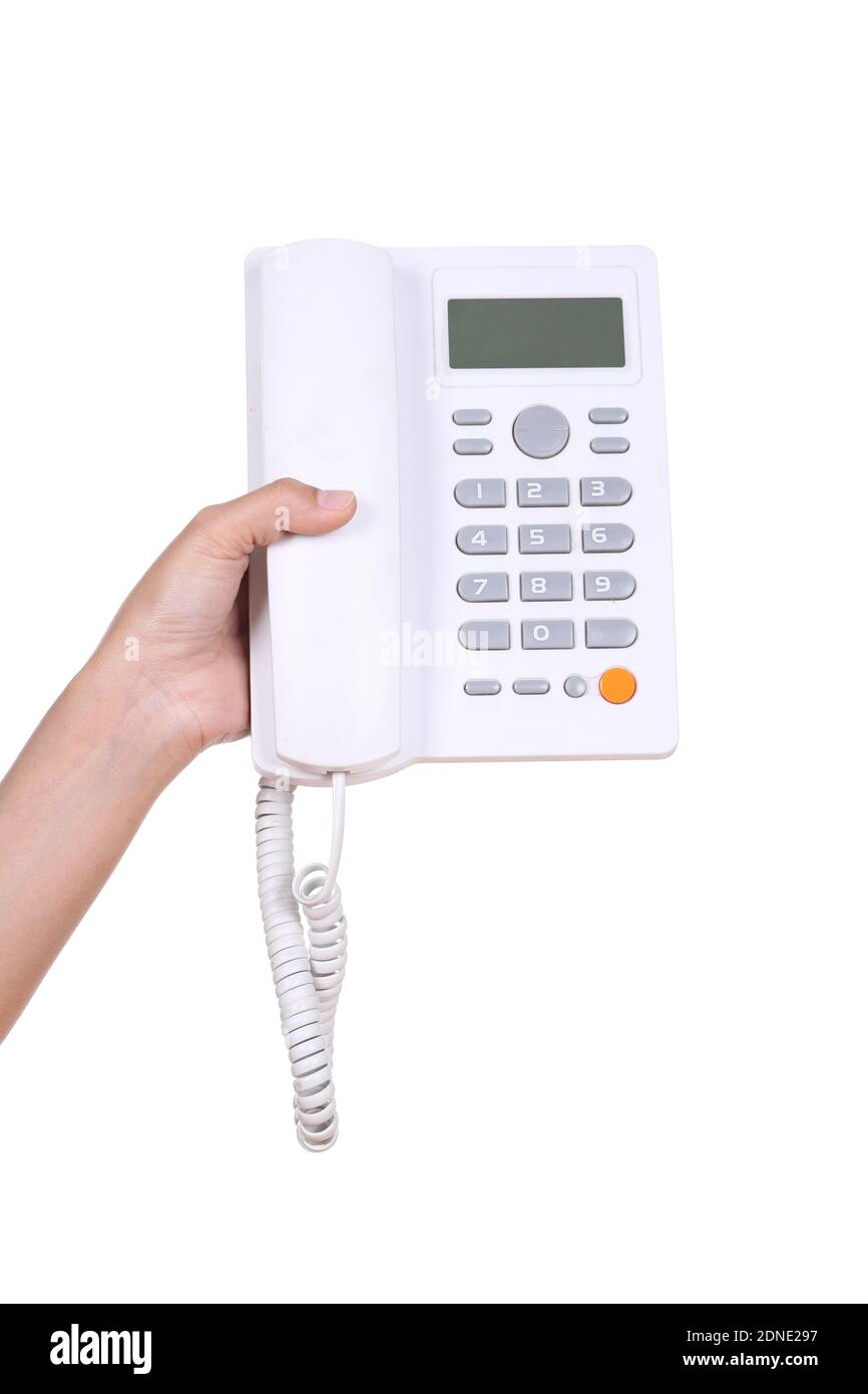 Hand holding landline phone Cut Out Stock Images & Pictures - Alamy