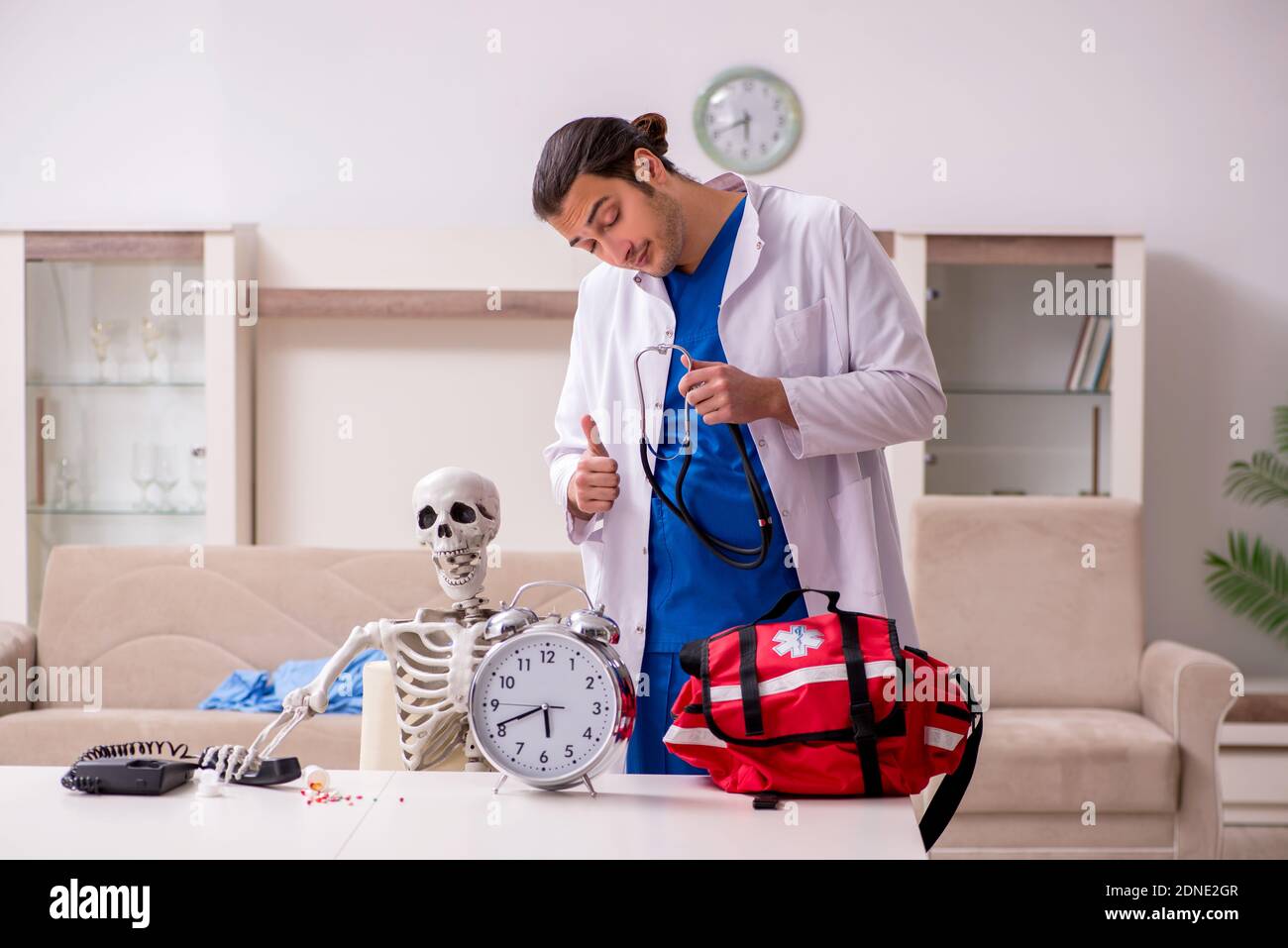Male paramedic visiting skeleton patient Stock Photo - Alamy