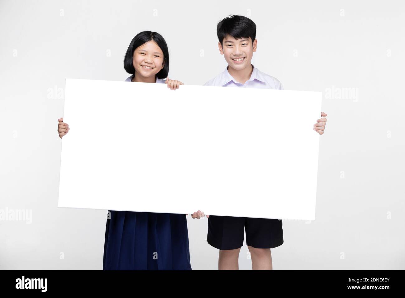 Two boys holding placard hi-res stock photography and images - Alamy