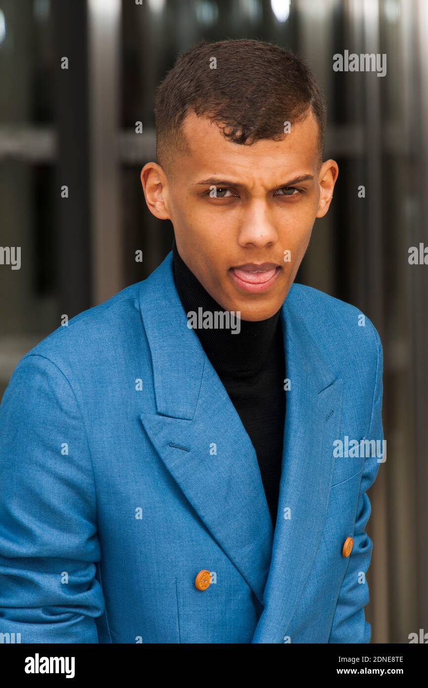 Stromae arriving for the Louis Vuitton Fall/Winter 2015-2016 Ready-To ...
