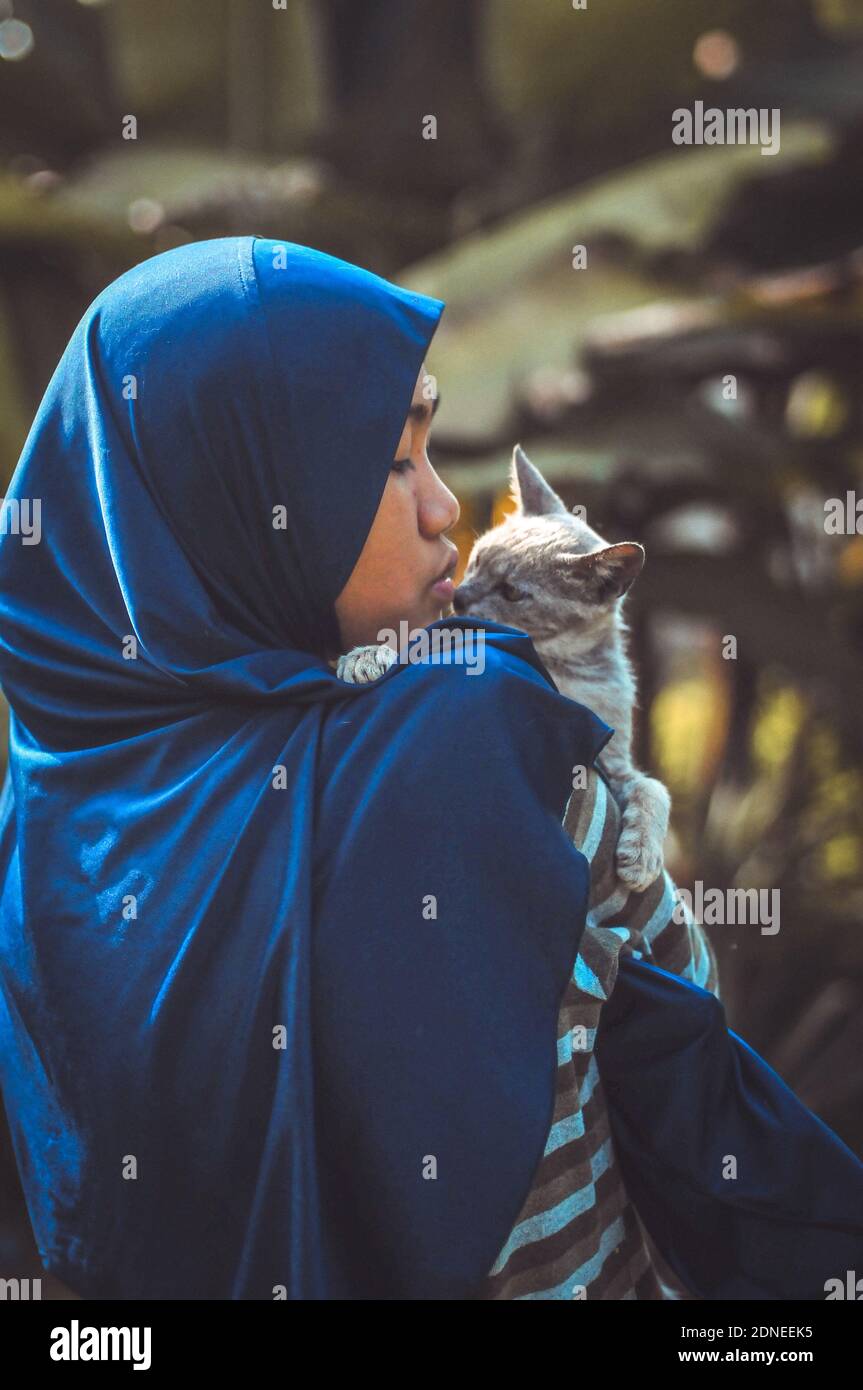 Indian girl with pet cat hi-res stock photography and images - Alamy