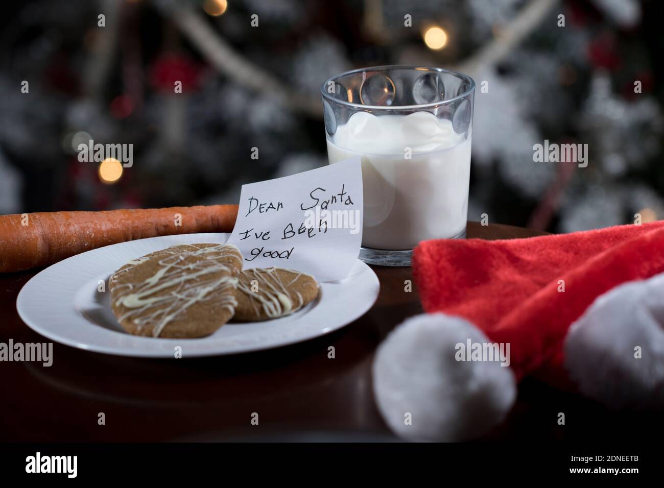 Note and cookies for Santa Christmas background. Milk and cookies on a ...