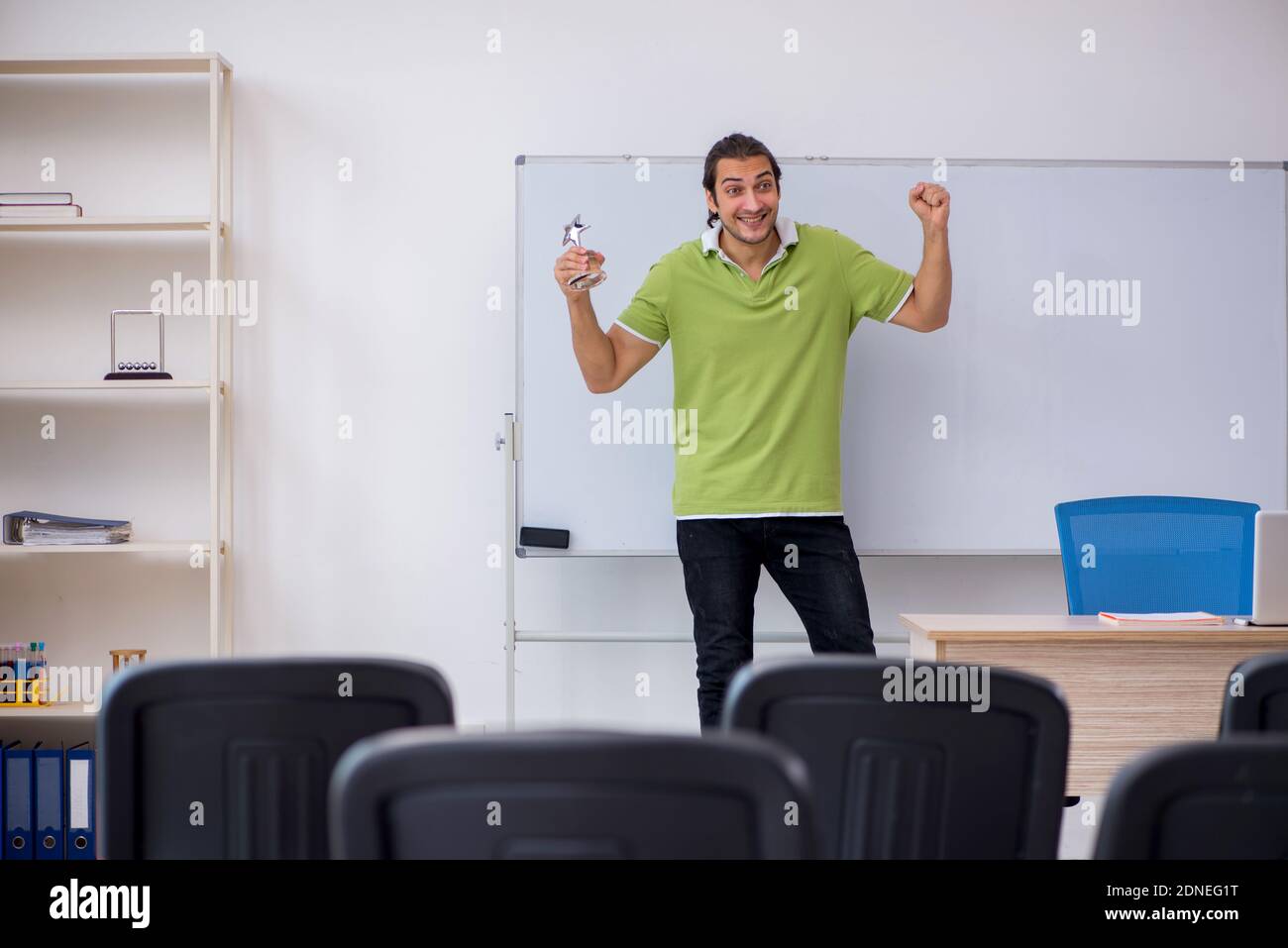 Young student in business presentation concept Stock Photo - Alamy