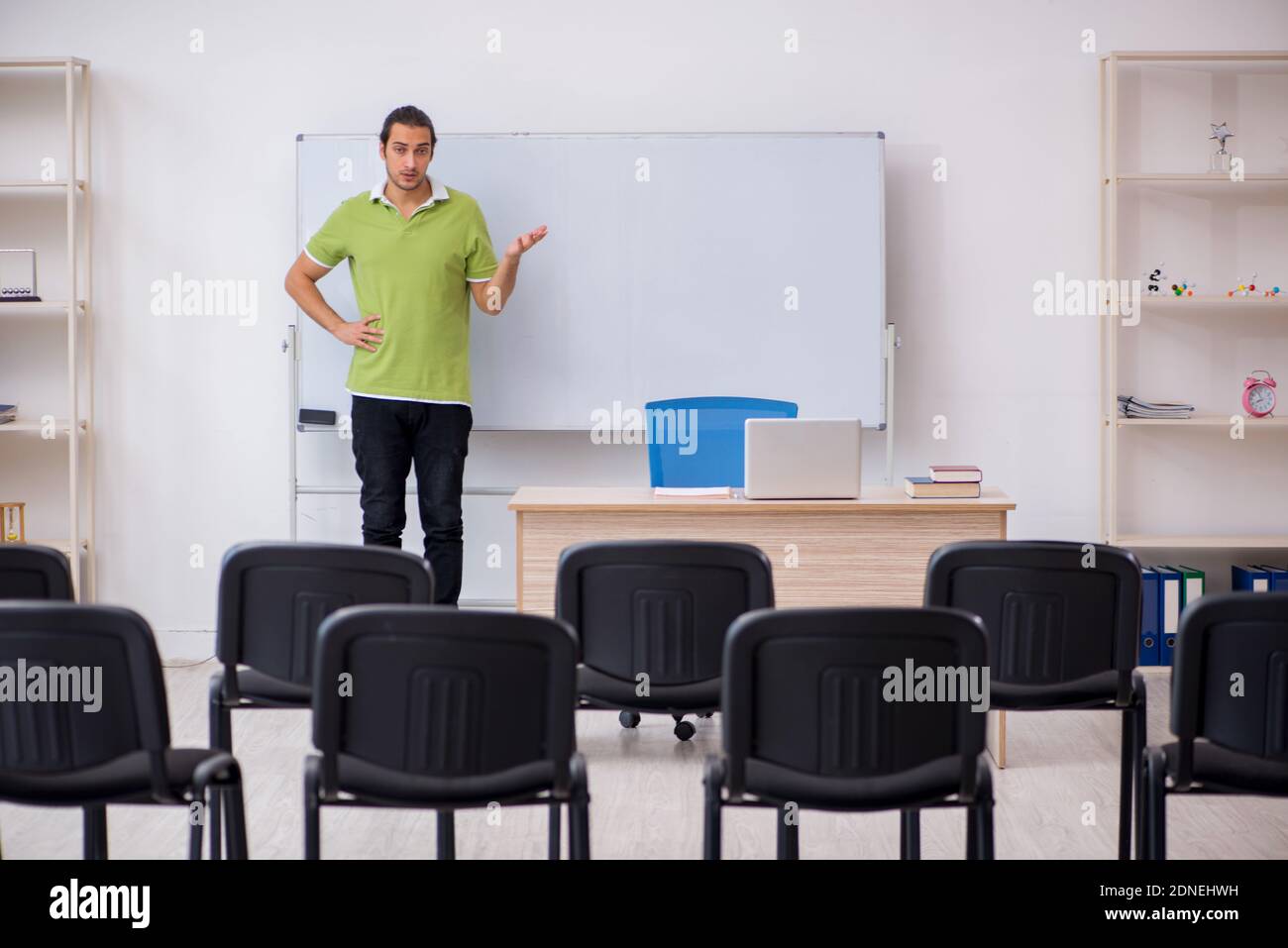 Young student in business presentation concept Stock Photo - Alamy