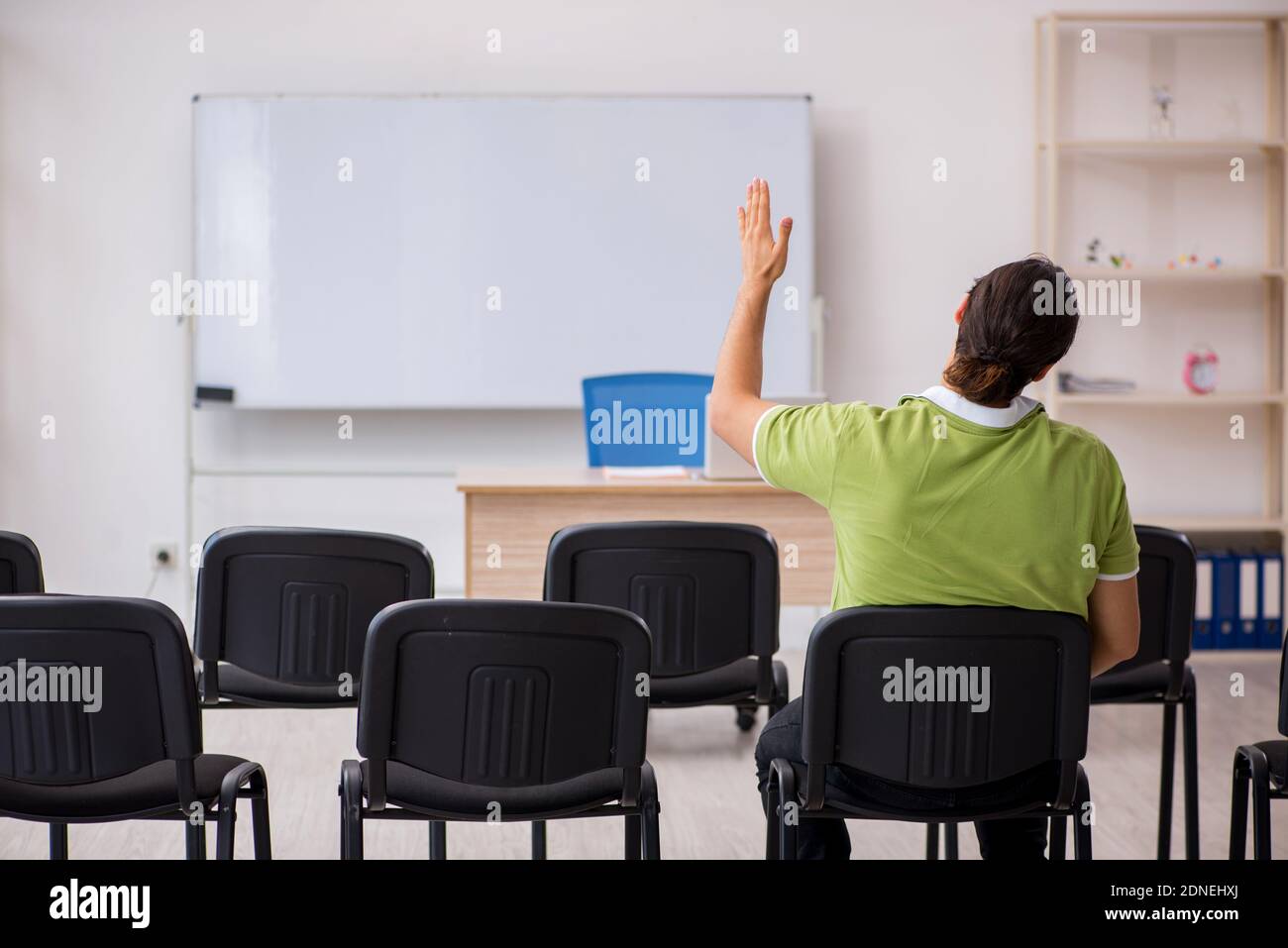 Young student in business presentation concept Stock Photo - Alamy