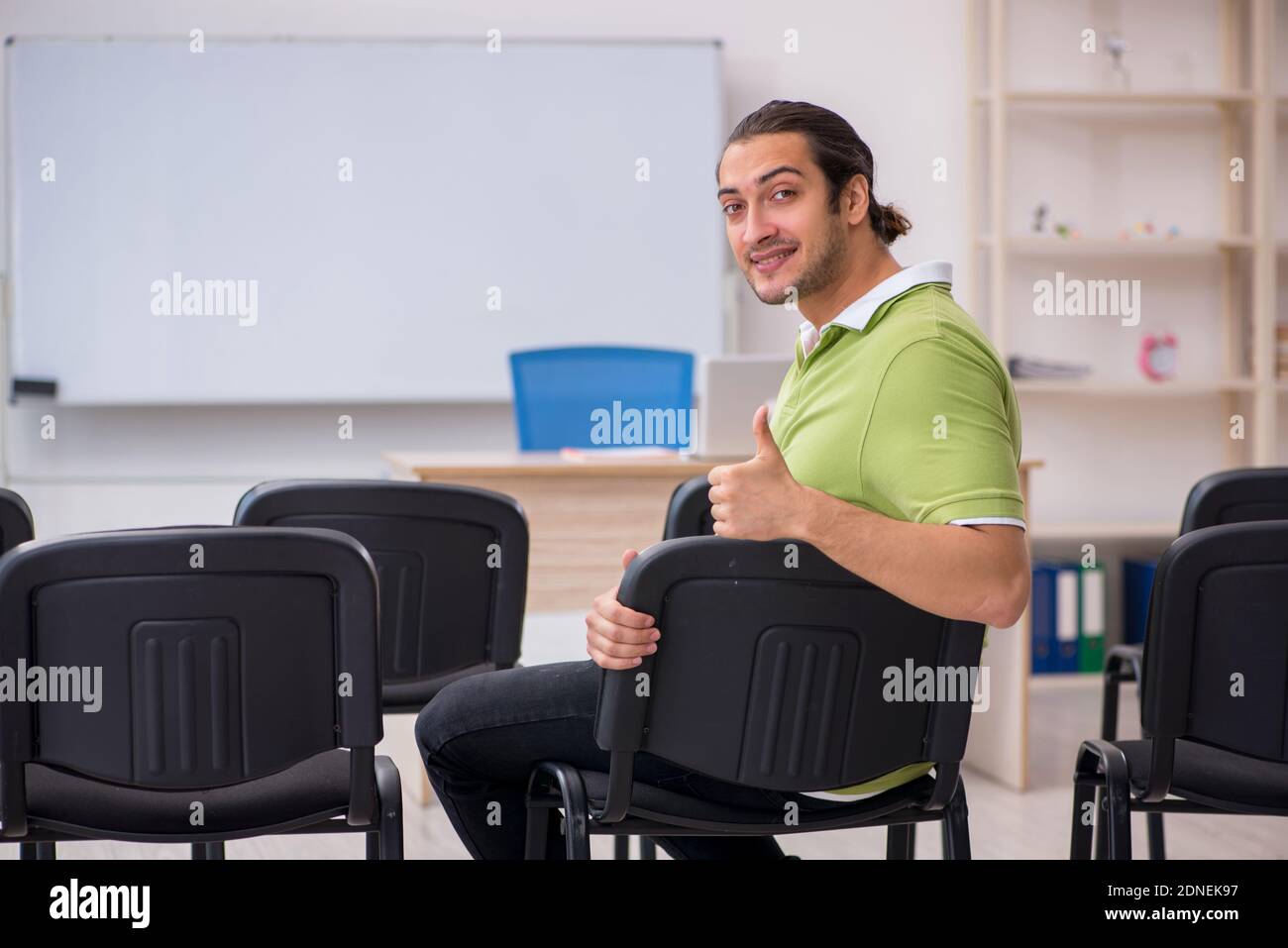 Young student in business presentation concept Stock Photo - Alamy