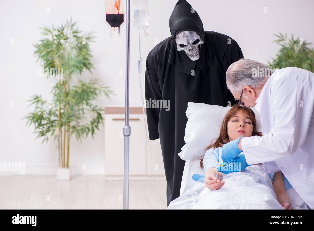 Devil, old doctor and female patient in clinic Stock Photo - Alamy