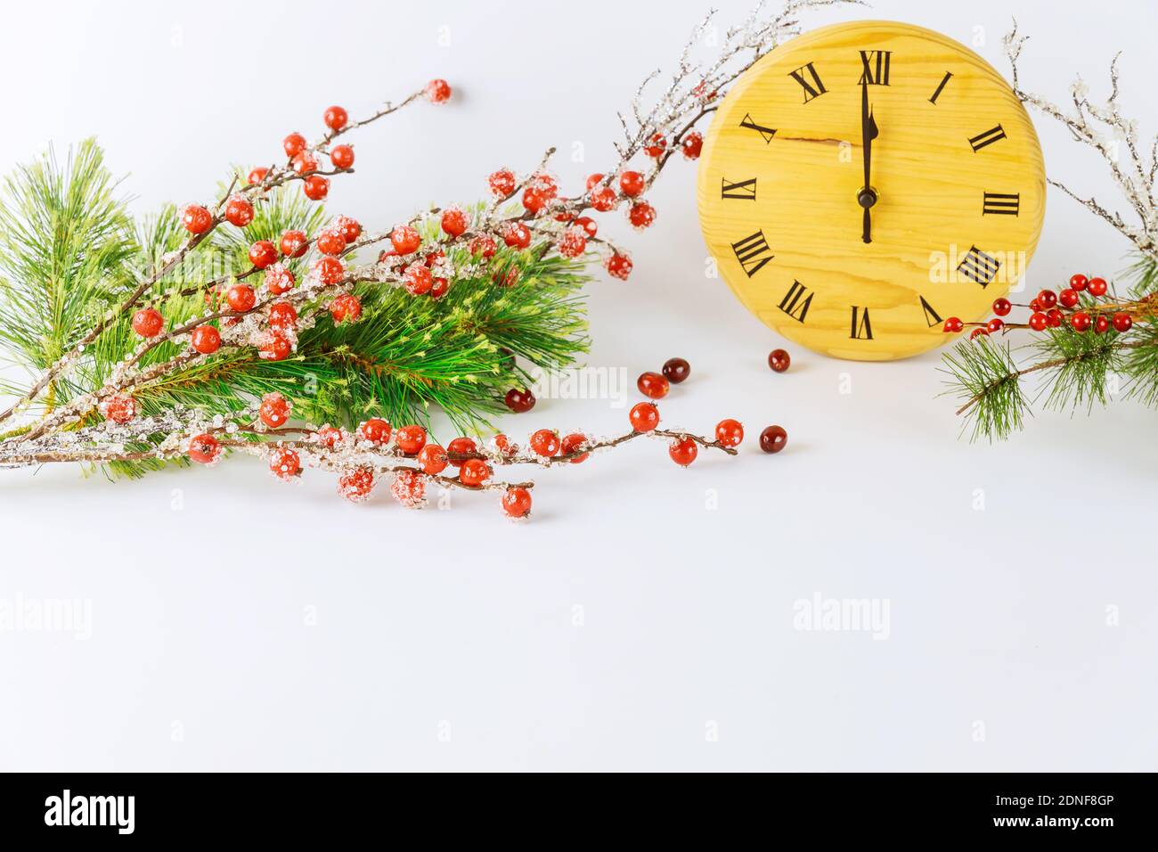 New Year eve. Clock face with hour hand are at 12 oclock and decoration ...