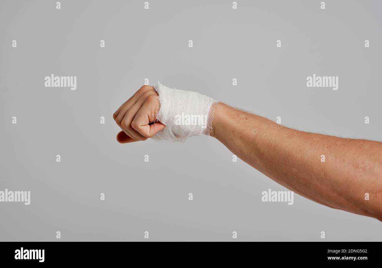 injured arm bandaging patient health problems medicine Stock Photo - Alamy