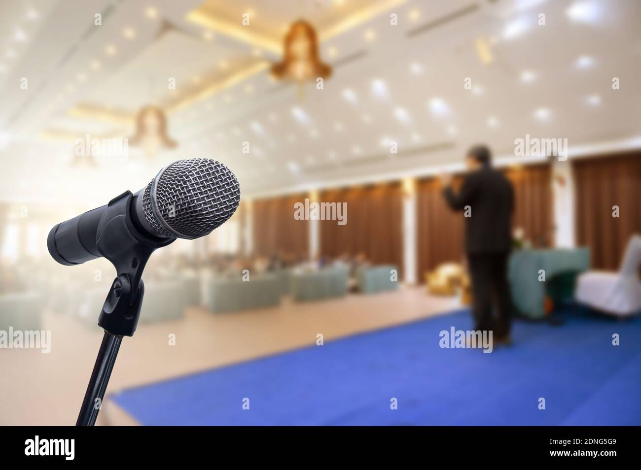 Standing gesturing microphone communication hi-res stock photography ...