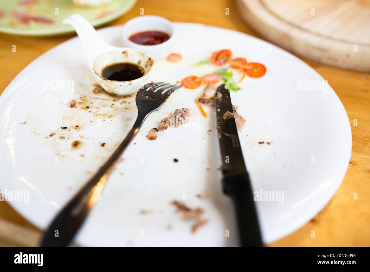 Dirty dish wooden spoon kitchen hi-res stock photography and images - Alamy