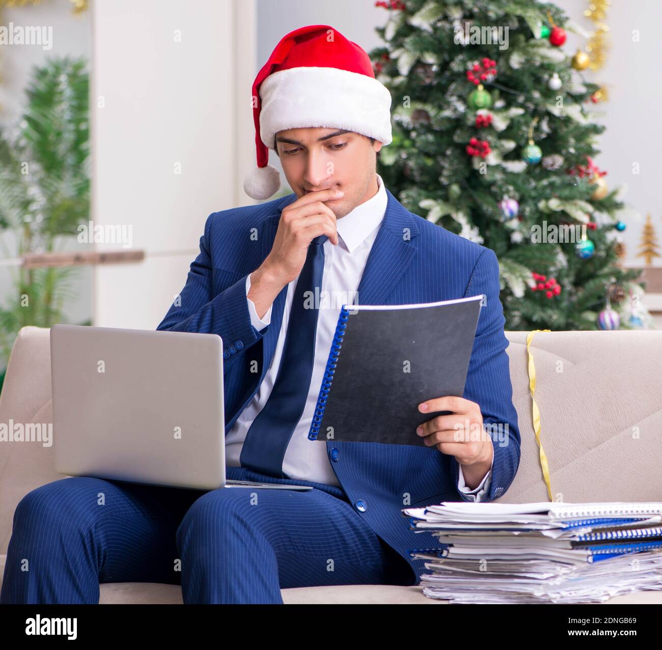 The busy employee working from home Stock Photo - Alamy