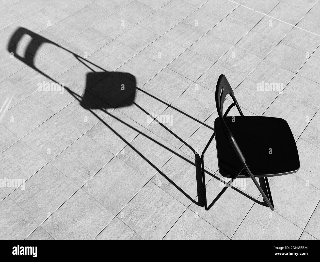 Shadow on chair Black and White Stock Photos & Images - Alamy