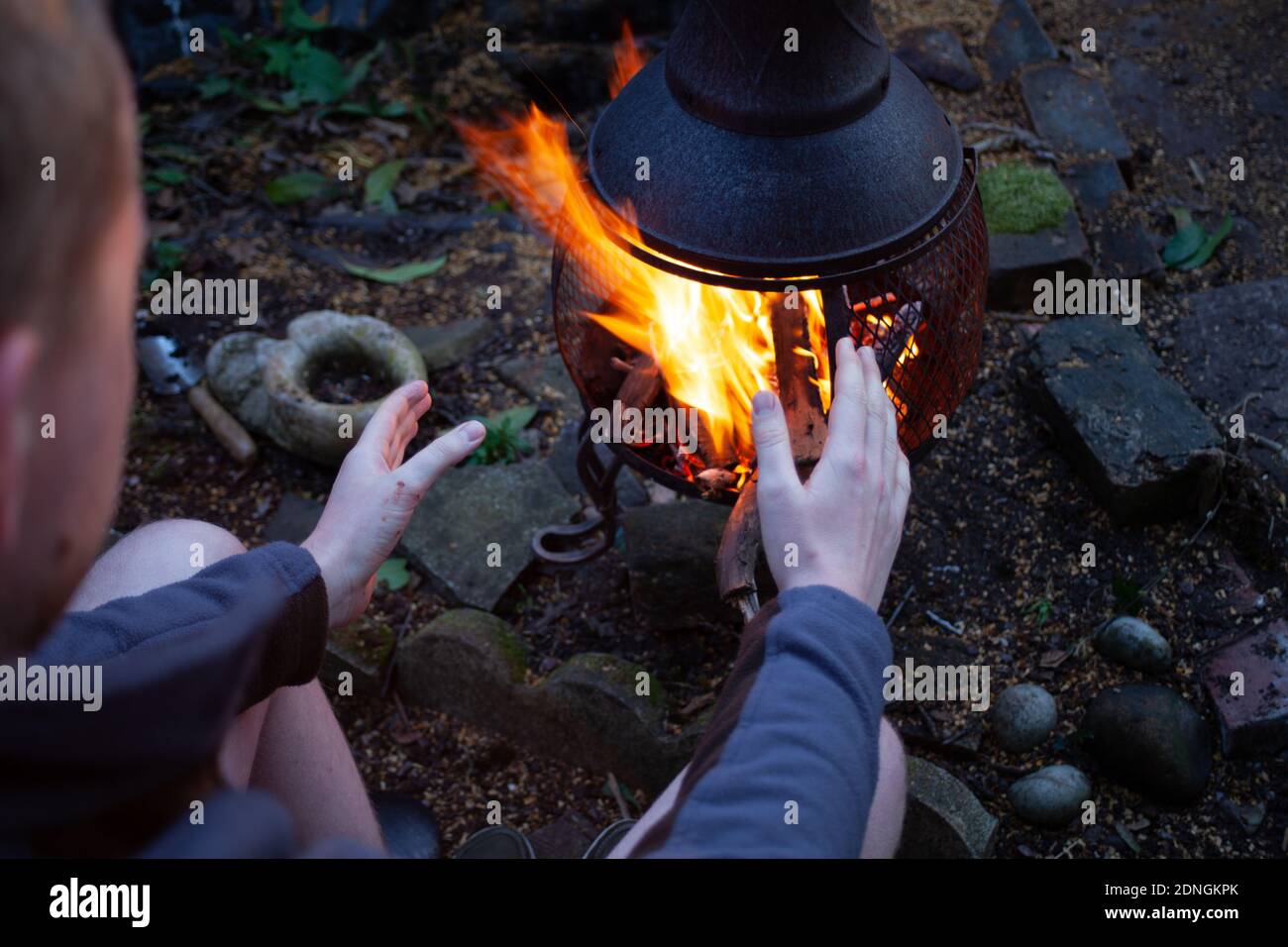 Warming hand over fire hi-res stock photography and images - Alamy
