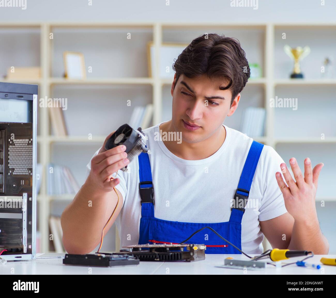 Computer hardware repair and fixing concept by experienced technician ...