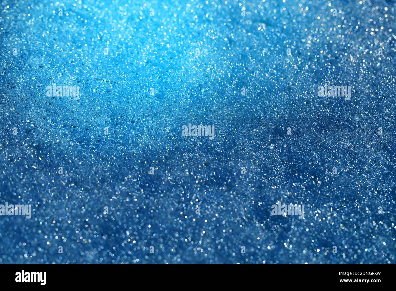 Photo background of beautiful blue melting snow and ice. Example of a ...