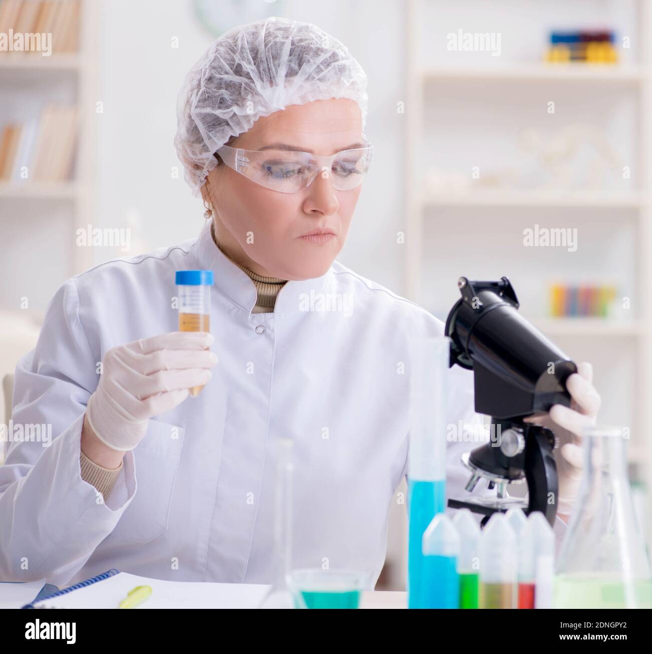 The doctor with test tube in medical hospital lab Stock Photo - Alamy