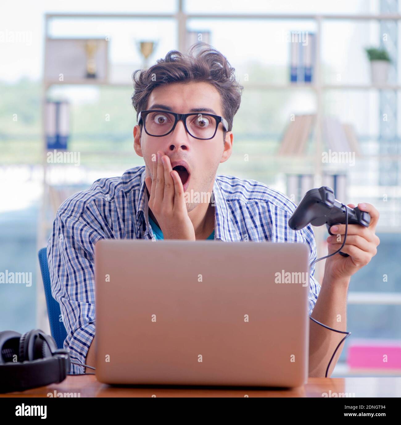The gamer addict playing computer games at home Stock Photo - Alamy