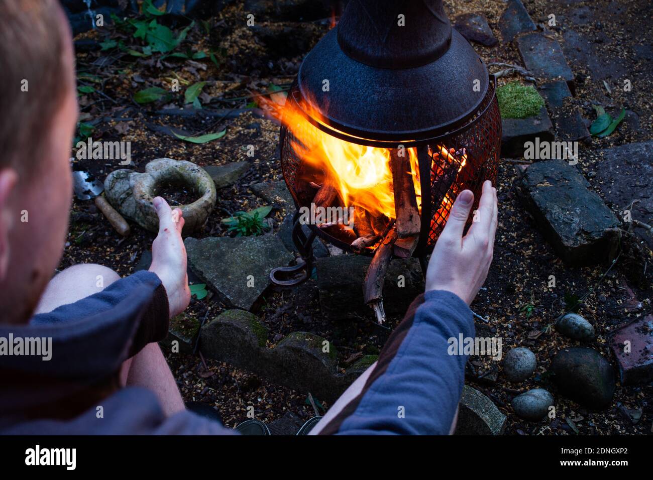 Warming hand over fire hi-res stock photography and images - Alamy