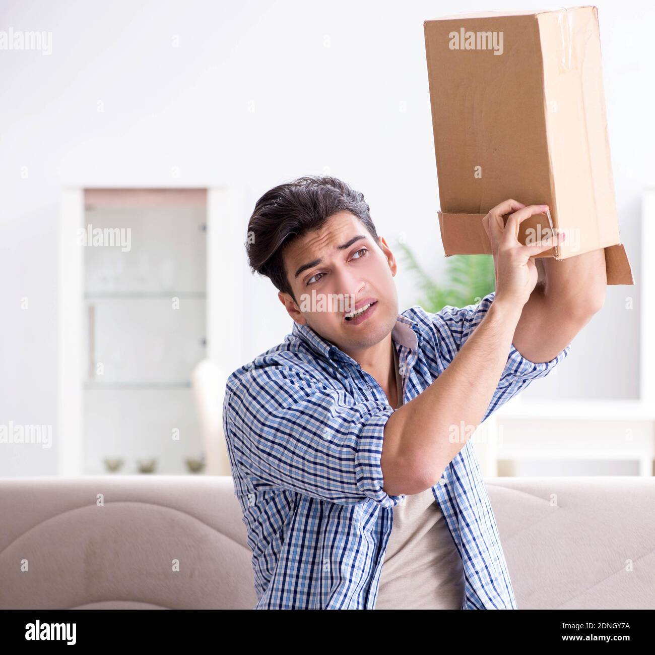 The man receiving empty parcel with stolen goods Stock Photo - Alamy