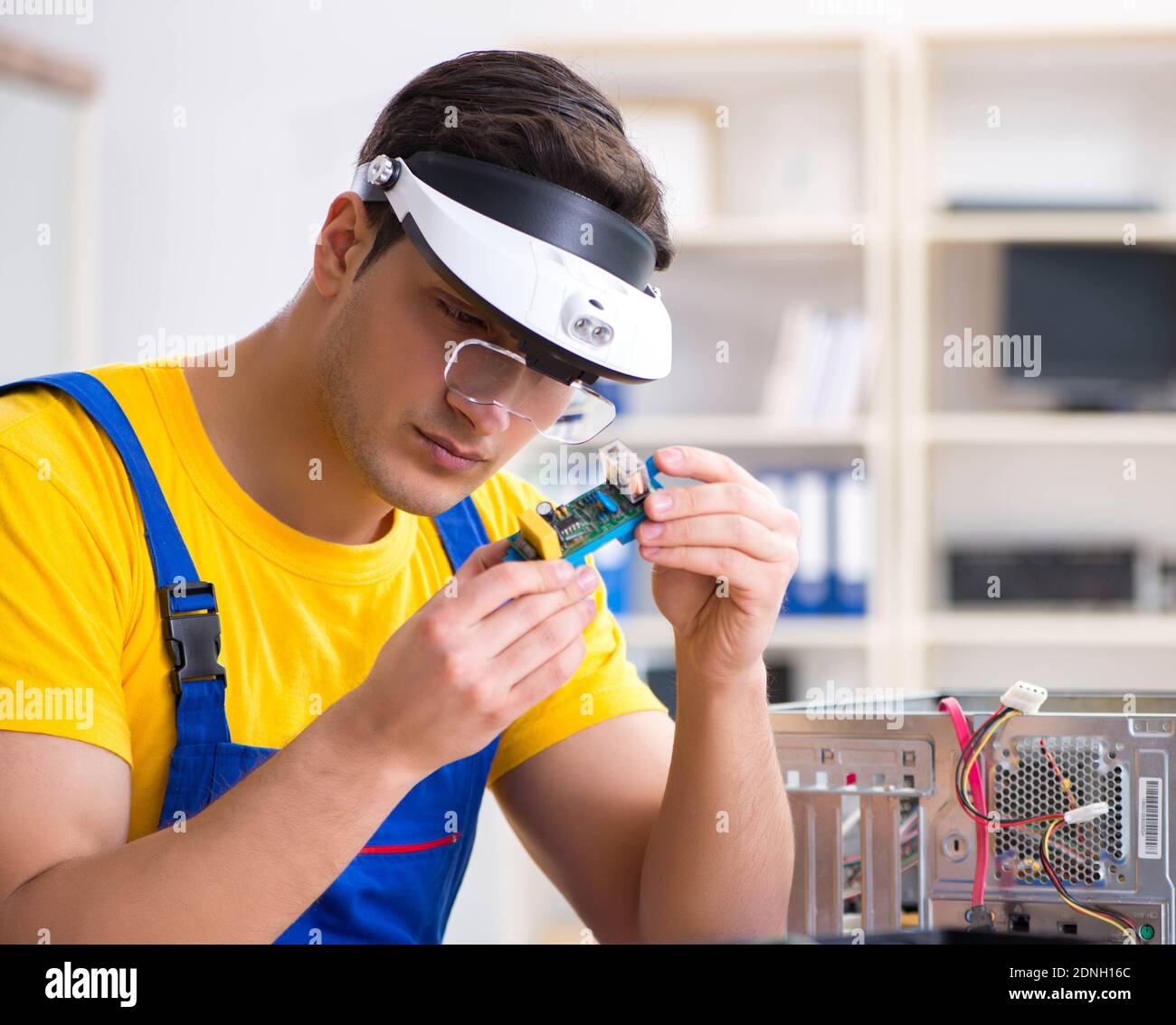 The computer repair technician repairing hardware Stock Photo - Alamy