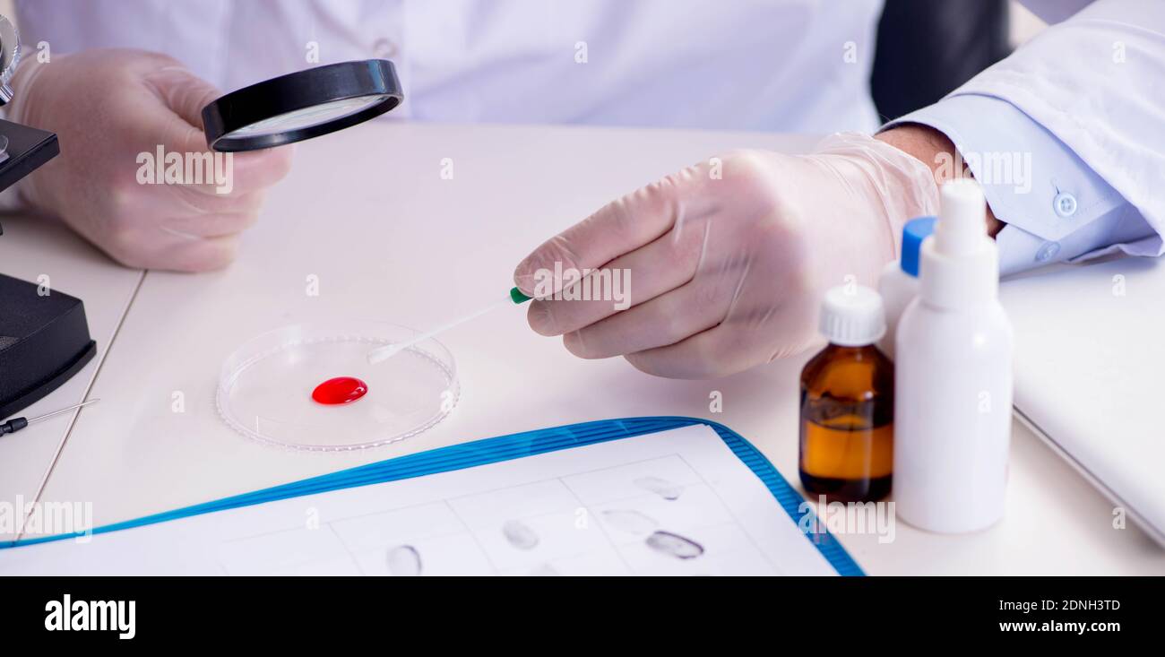 The drug synthesis lab experimentnig with pills Stock Photo - Alamy